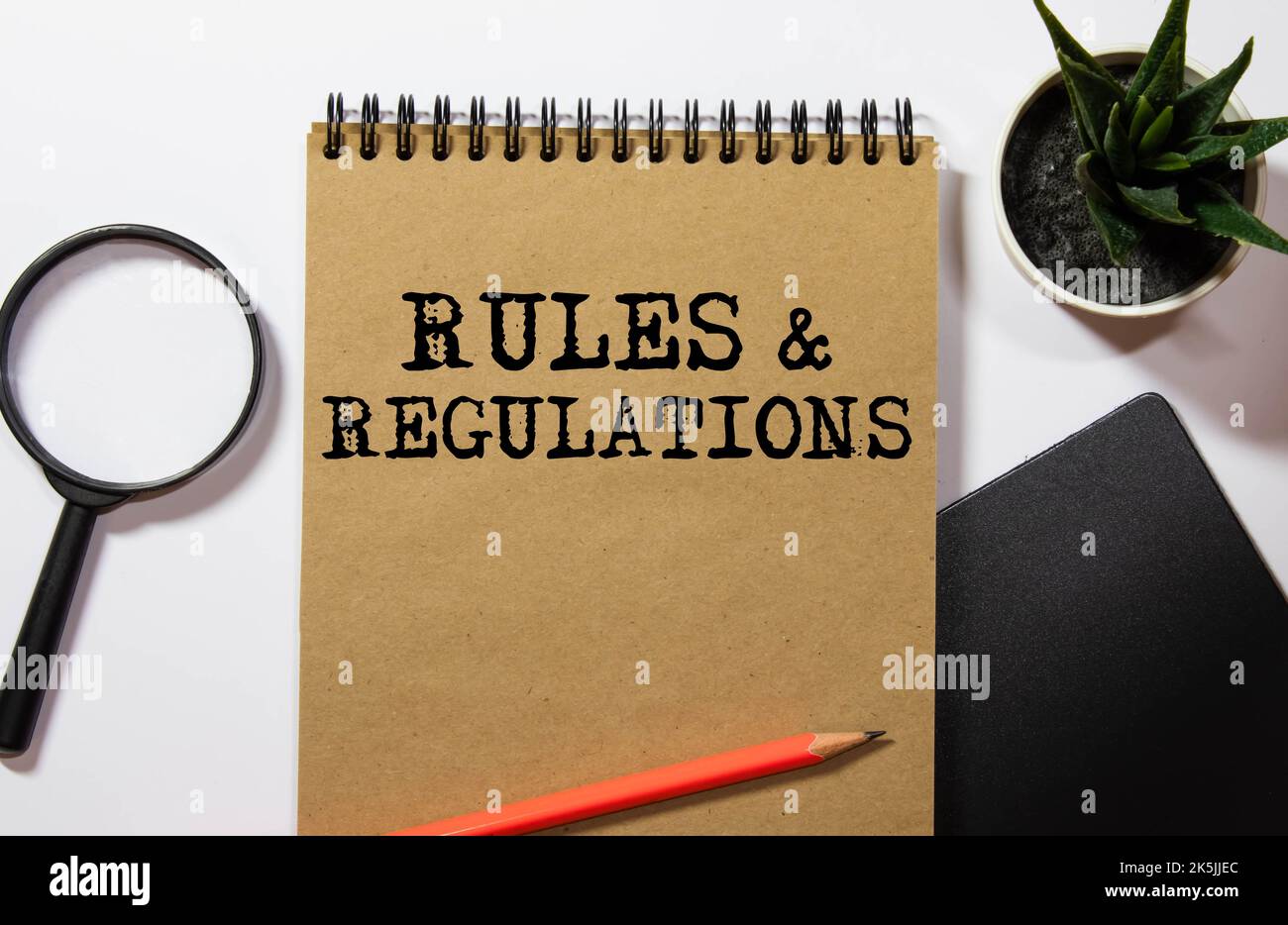 rules and regulations word under torn black sugar paper Stock Photo - Alamy