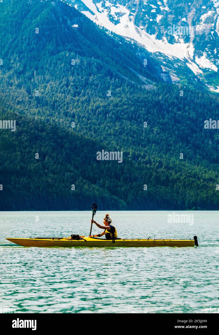 Colorful kayakers; Chilkoot Lake; Chilkoot State Recreation Site; Coast ...