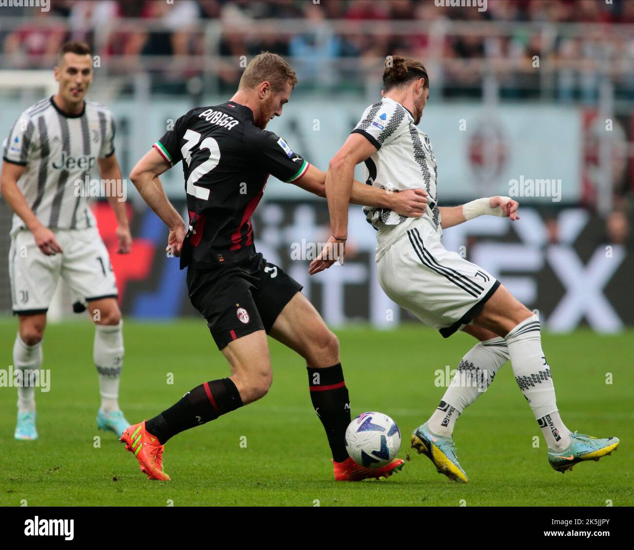 Tommaso Pobega of Ac Milan and Adrien Rabiot of Juventus Fc during the ...