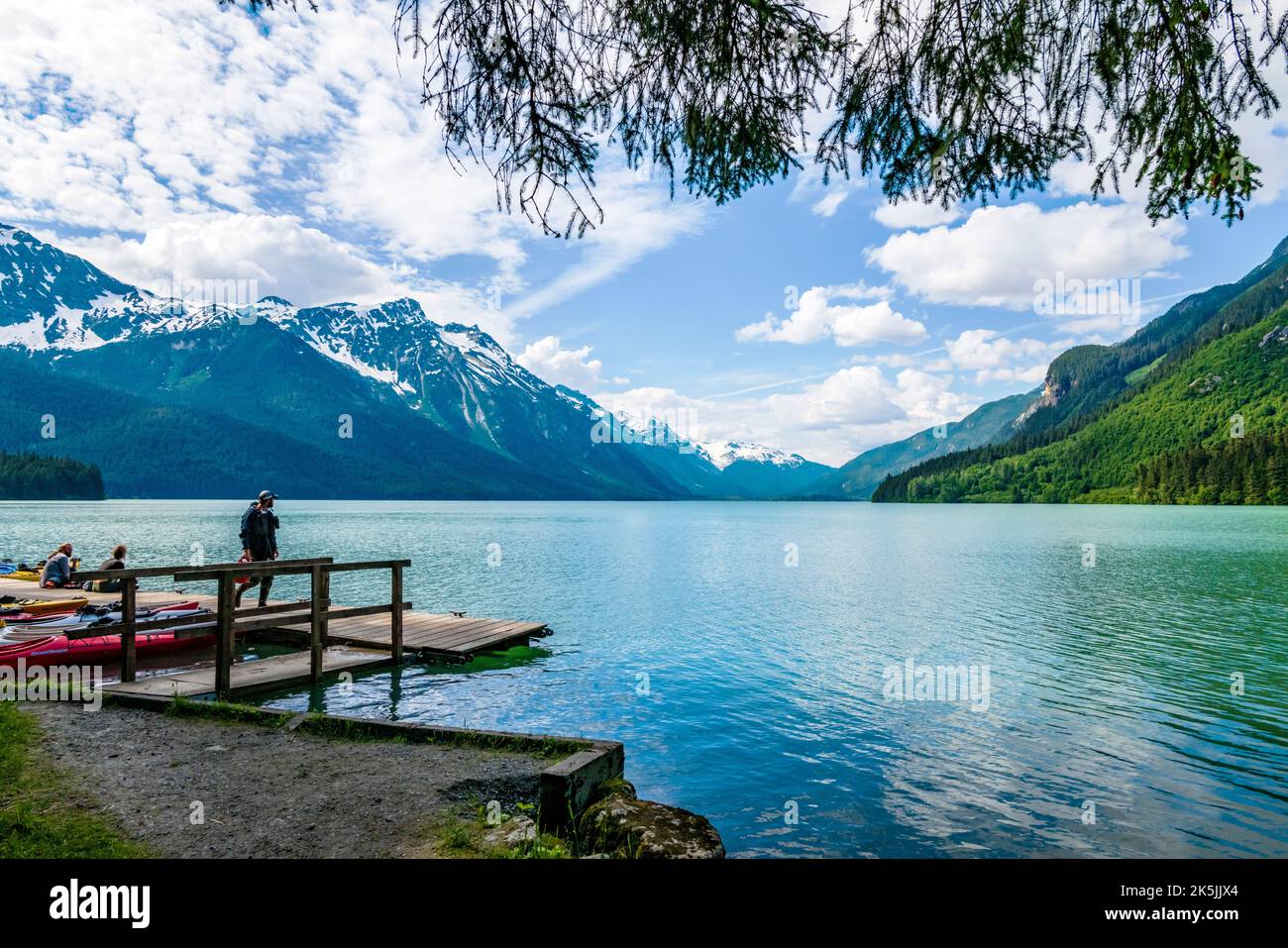 Kayaker on dock; Chilkoot Lake; Chilkoot State Recreation Site; Coast ...