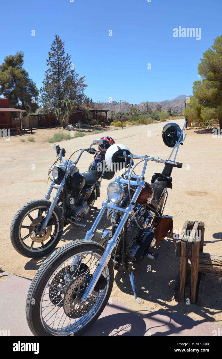 Two motorbikes parked in the California desert Stock Photo - Alamy