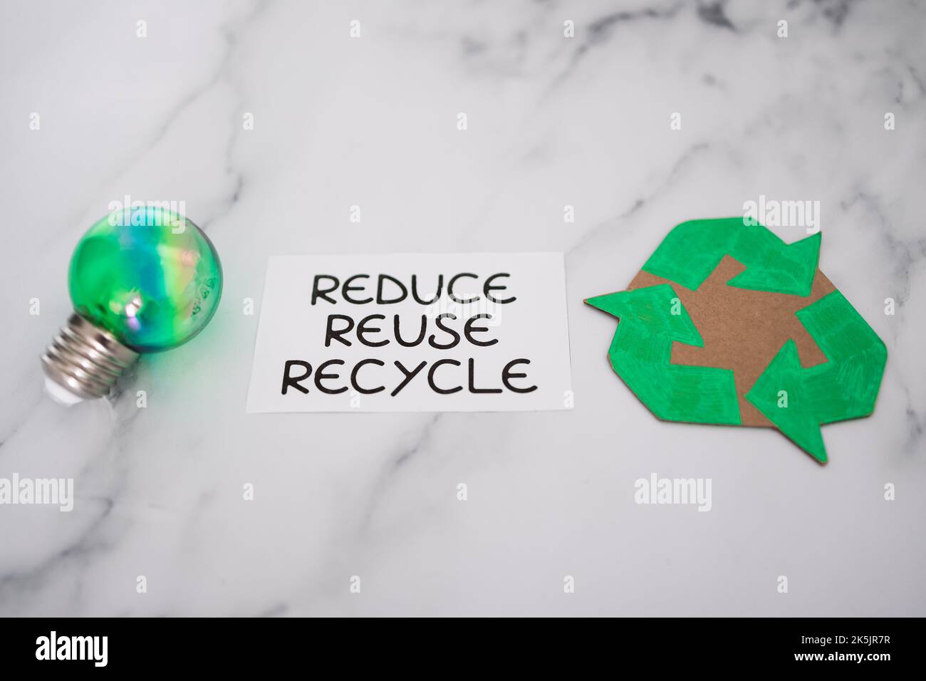 reduce reuse recycle sign with green light bulb and recycle icon ...