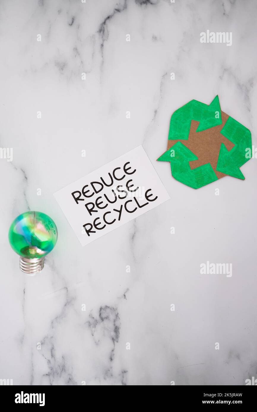 reduce reuse recycle sign with green light bulb and recycle icon ...