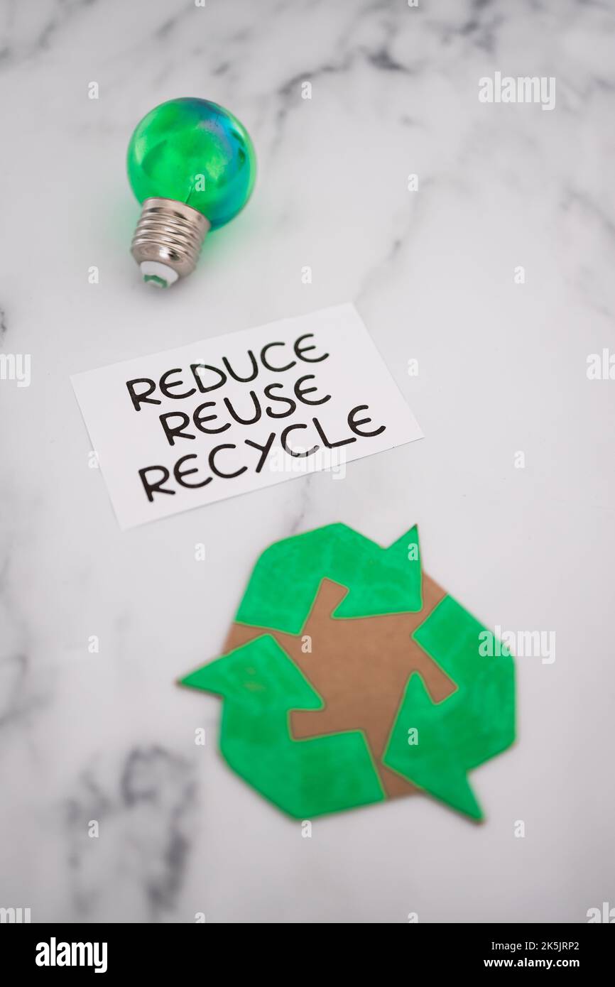 reduce reuse recycle sign with green light bulb and recycle icon ...