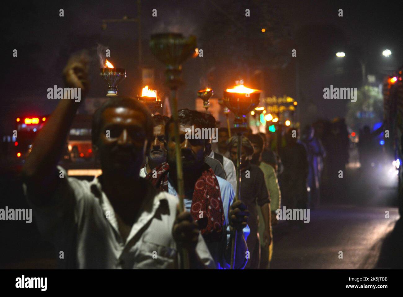 Pakistani people light fireworks on the eve of the Muslim festival of ...