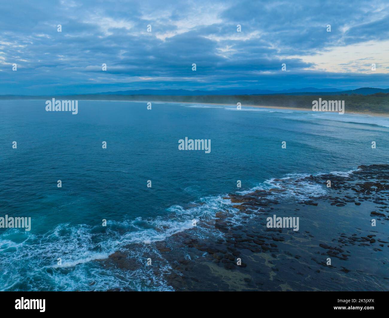 Sunrise aerial seascape at Broulee Beach on the South Coast of NSW ...
