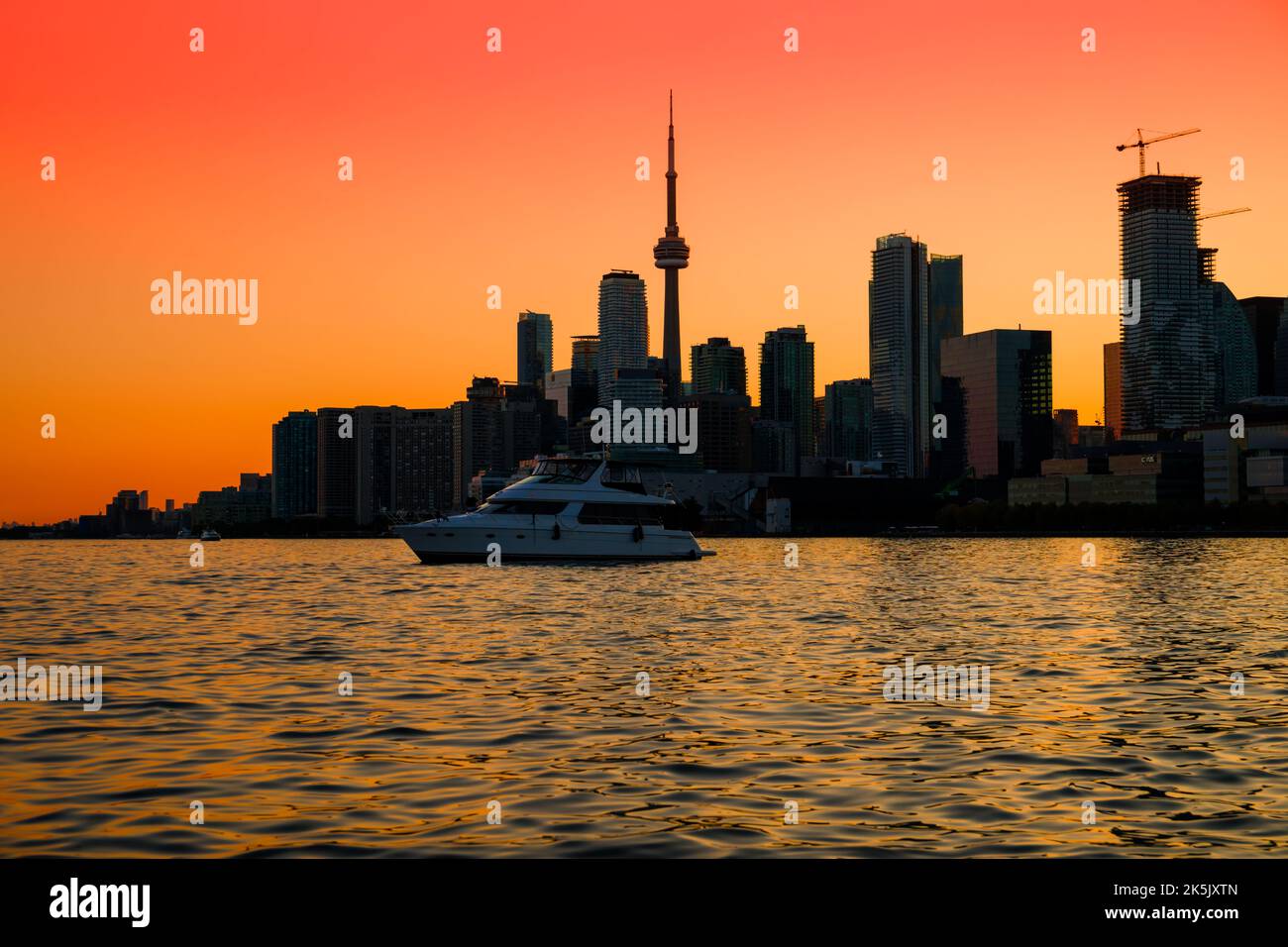 Toronto downtown cityscape with skyscrapers, white yacht and amazing ...