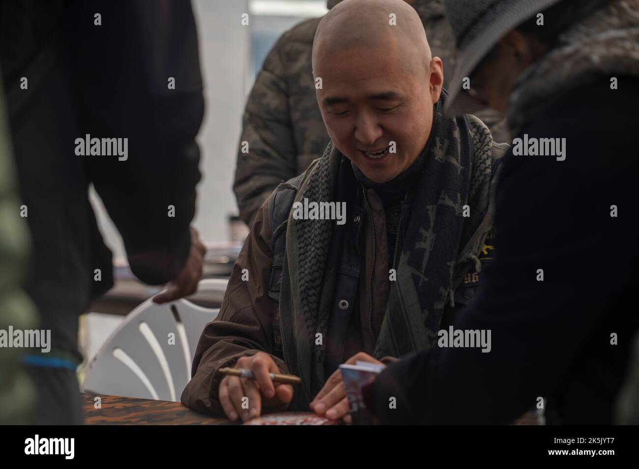 Sean Moon pastor of Rod of Iron ministries signs books at the Rod of ...