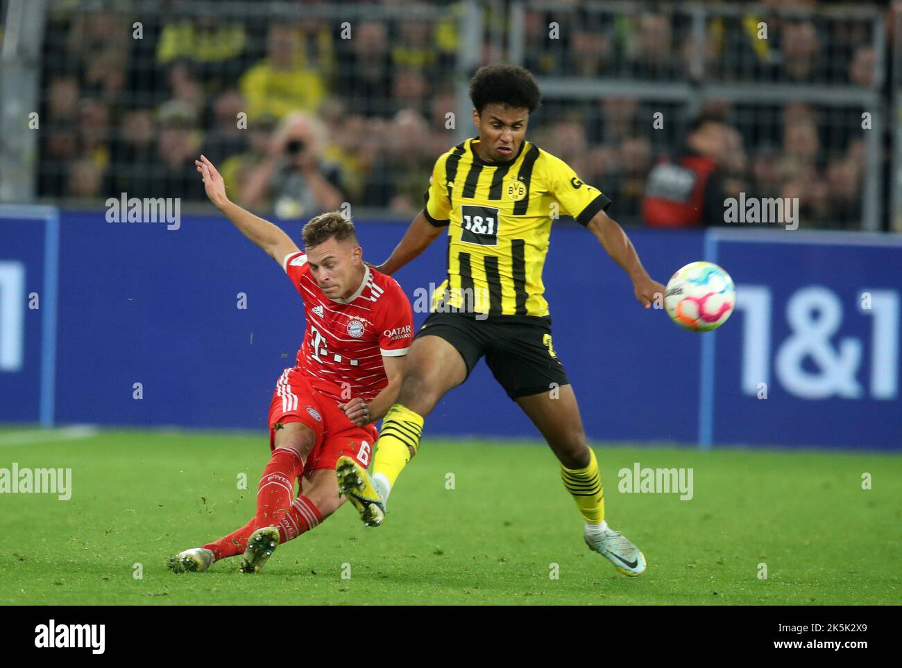 Joshua Kimmich of Bayern Muenchen Kari David Adeyemi of Borussia ...