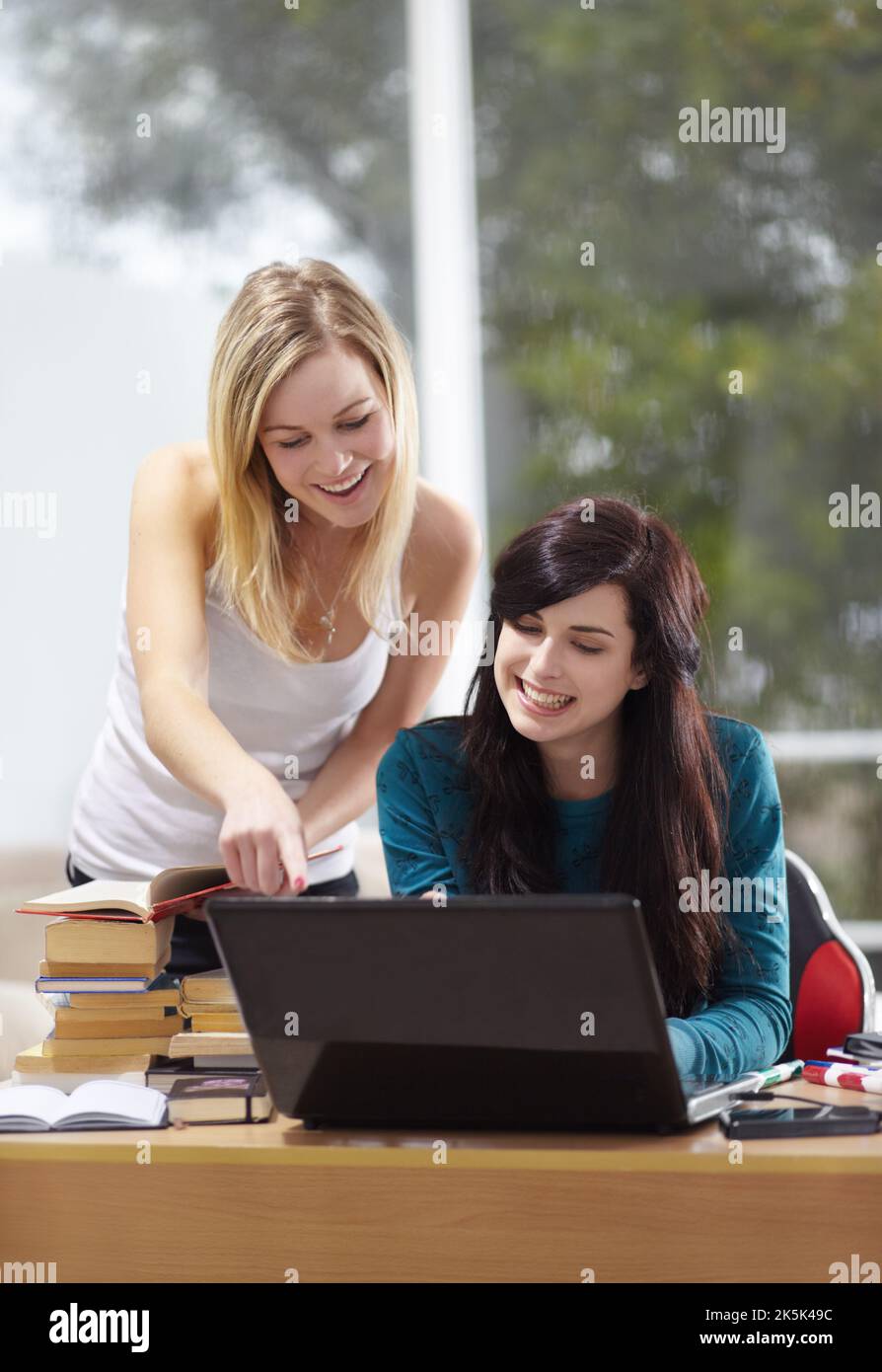 We better study this section too. Young female students studying ...
