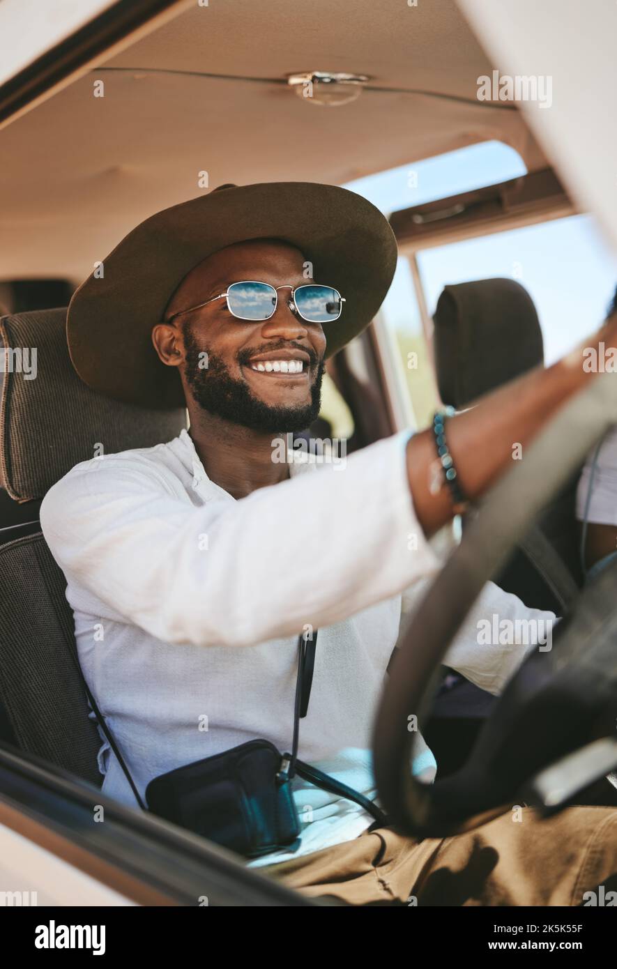 Travel, freedom and summer with black man driving in car on road trip ...