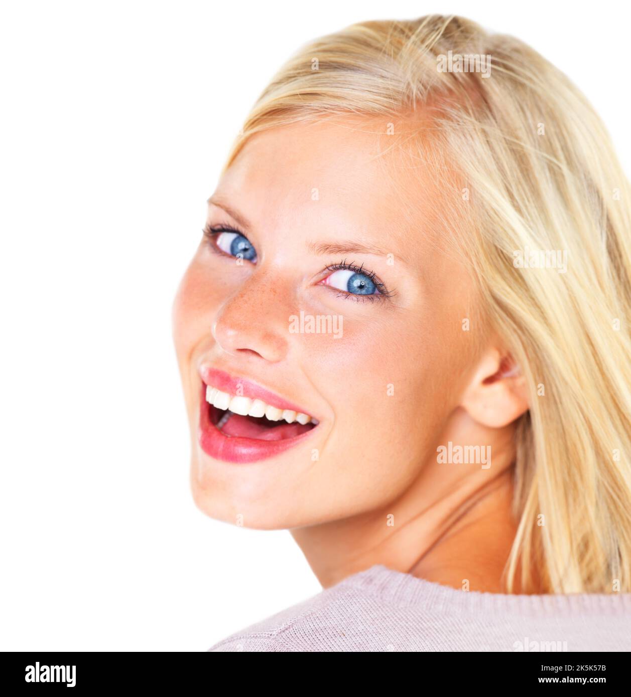 Laughing with delight. Beautiful young blond woman smiling and laughing ...