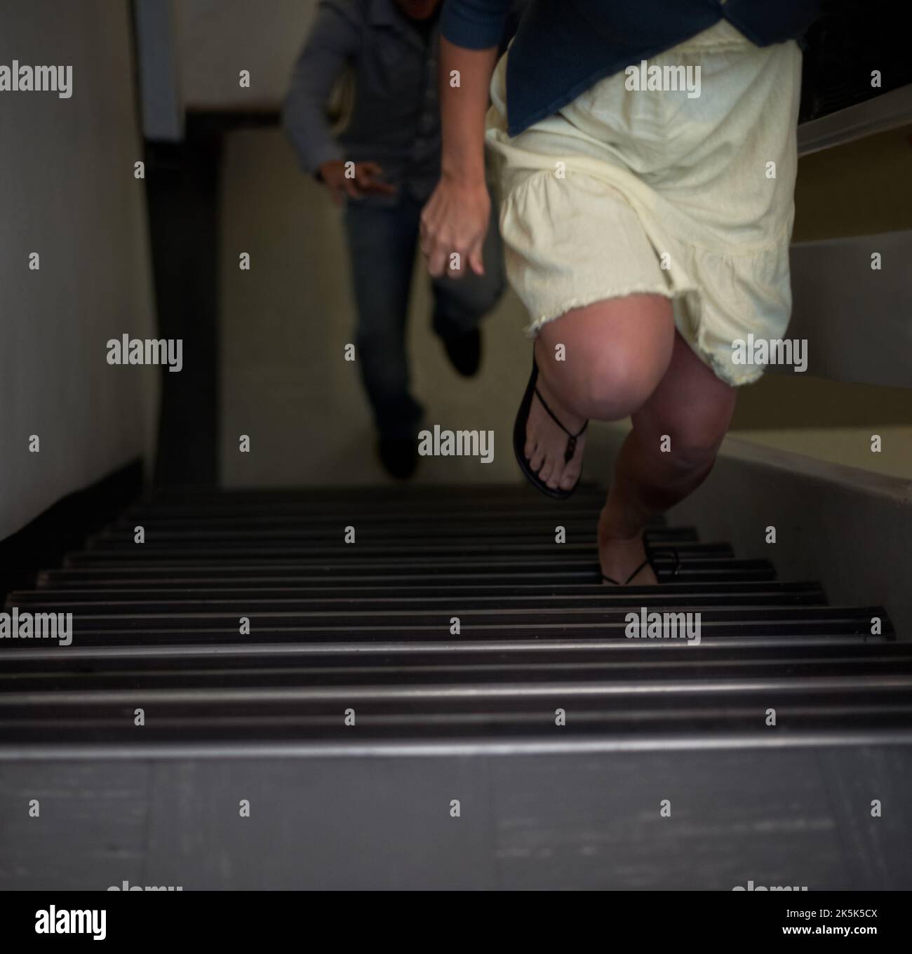 Trying to get away. Cropped view of a woman trying to run away from an ...