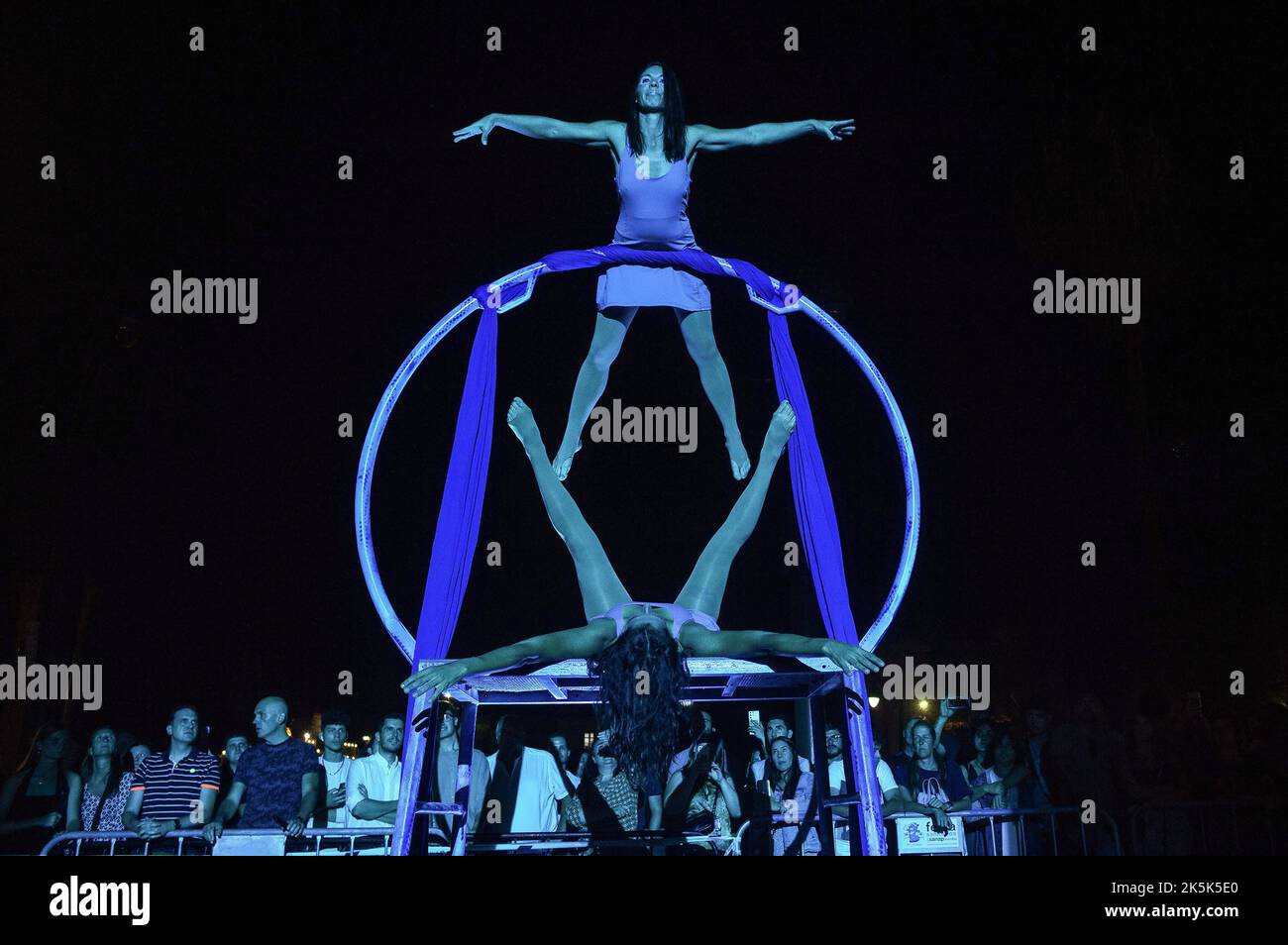 Acrobats perform at Plaza de la Marina square as they take part in the ...