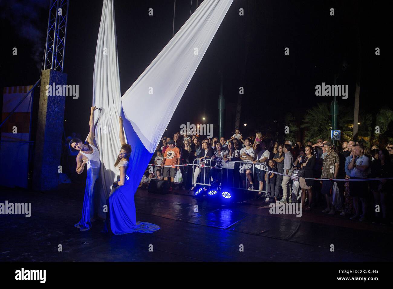 Acrobats perform at Plaza de la Marina square as she takes part in the ...