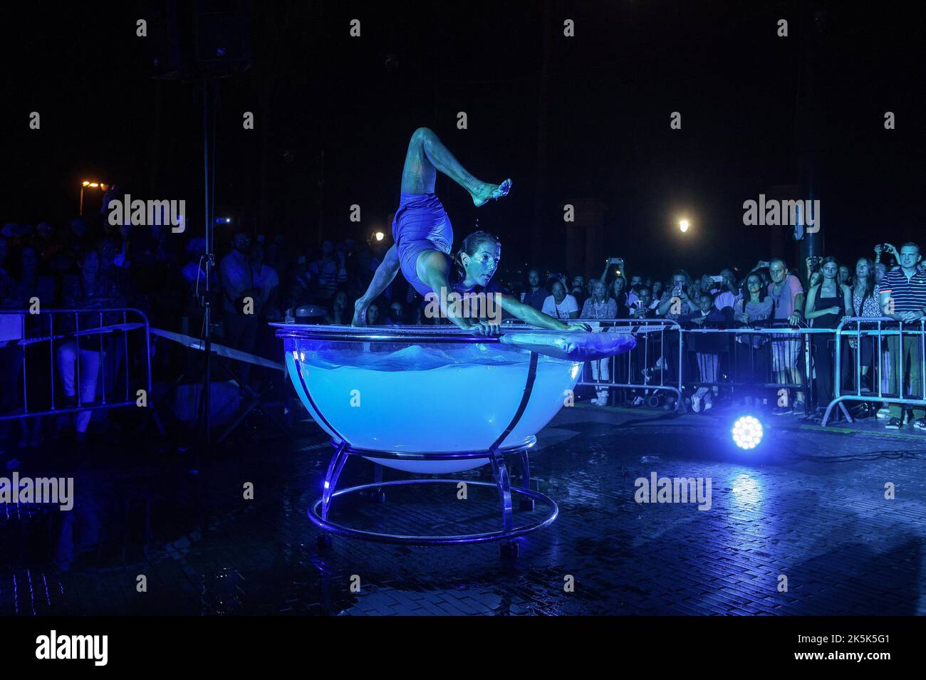 Acrobats perform at Plaza de la Marina square as they take part in the ...