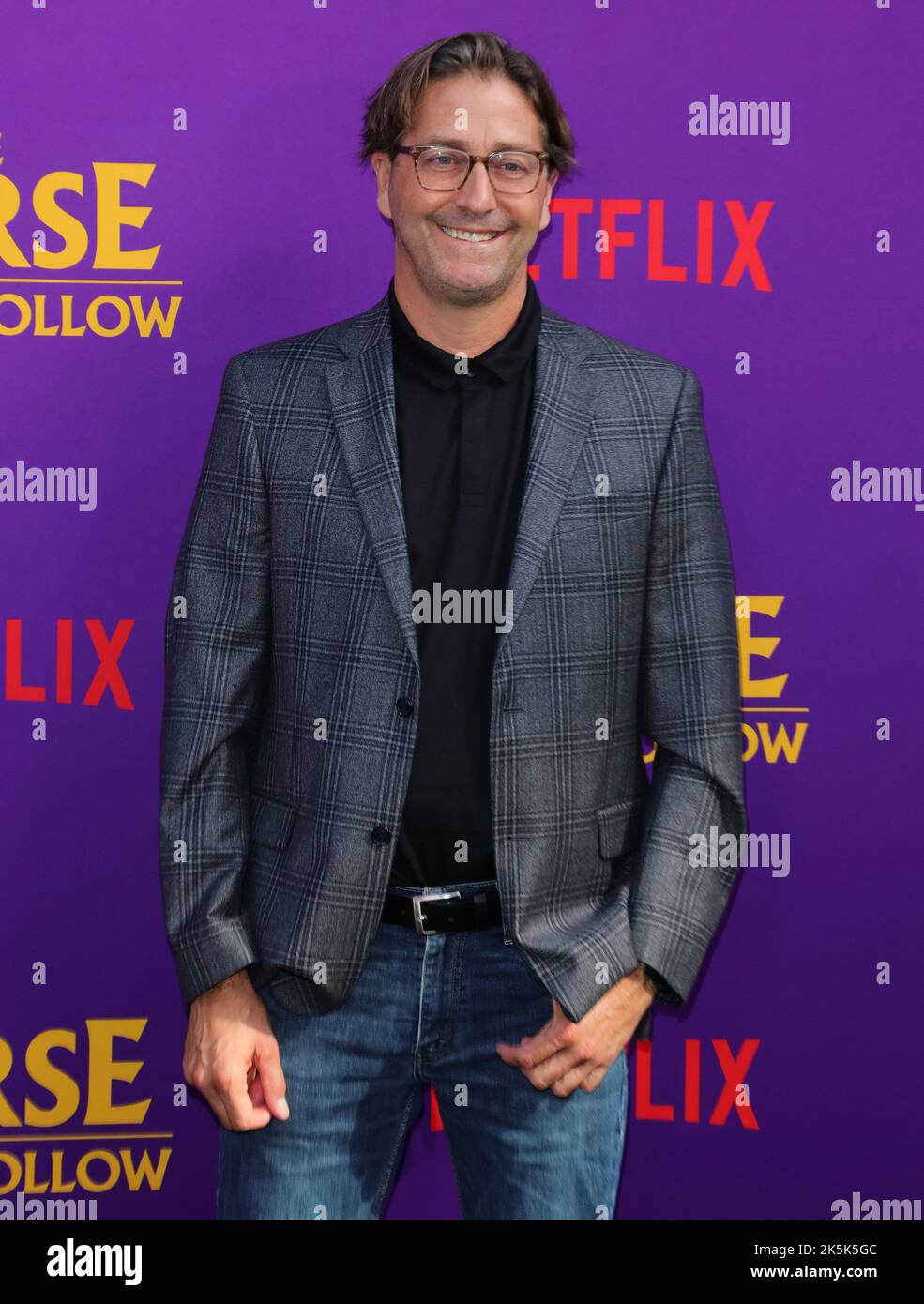 Nathan Reiman arrives at The Special Screening of Netflix The Curse of ...