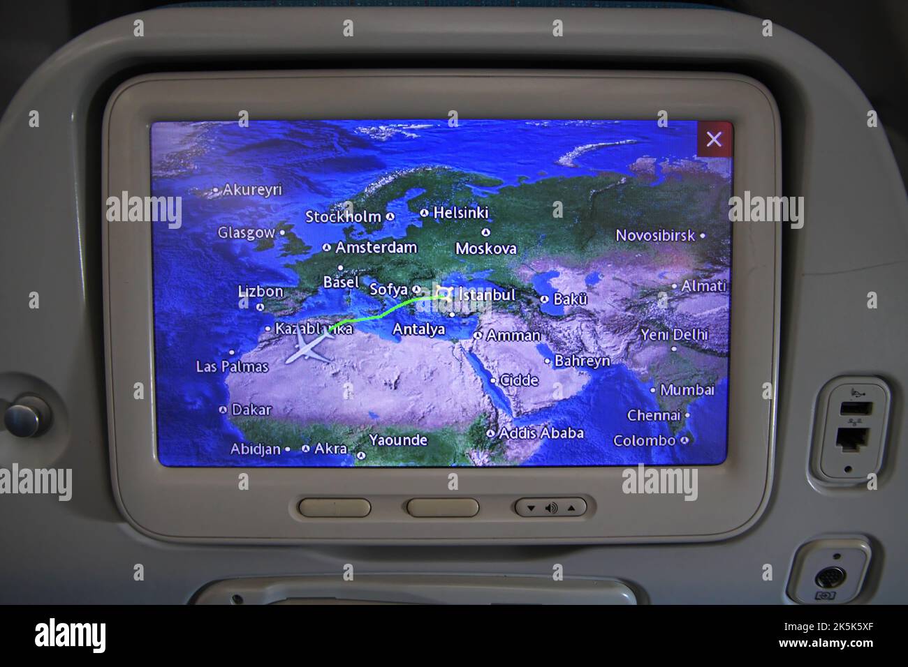 The map in the airplane Stock Photo - Alamy
