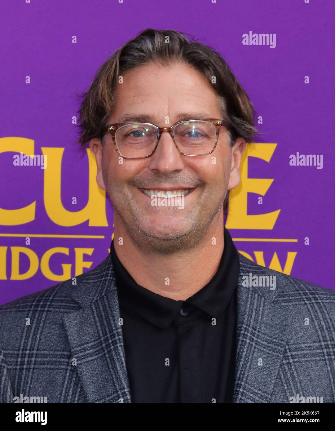 Nathan Reiman arrives at The Special Screening of Netflix The Curse of ...