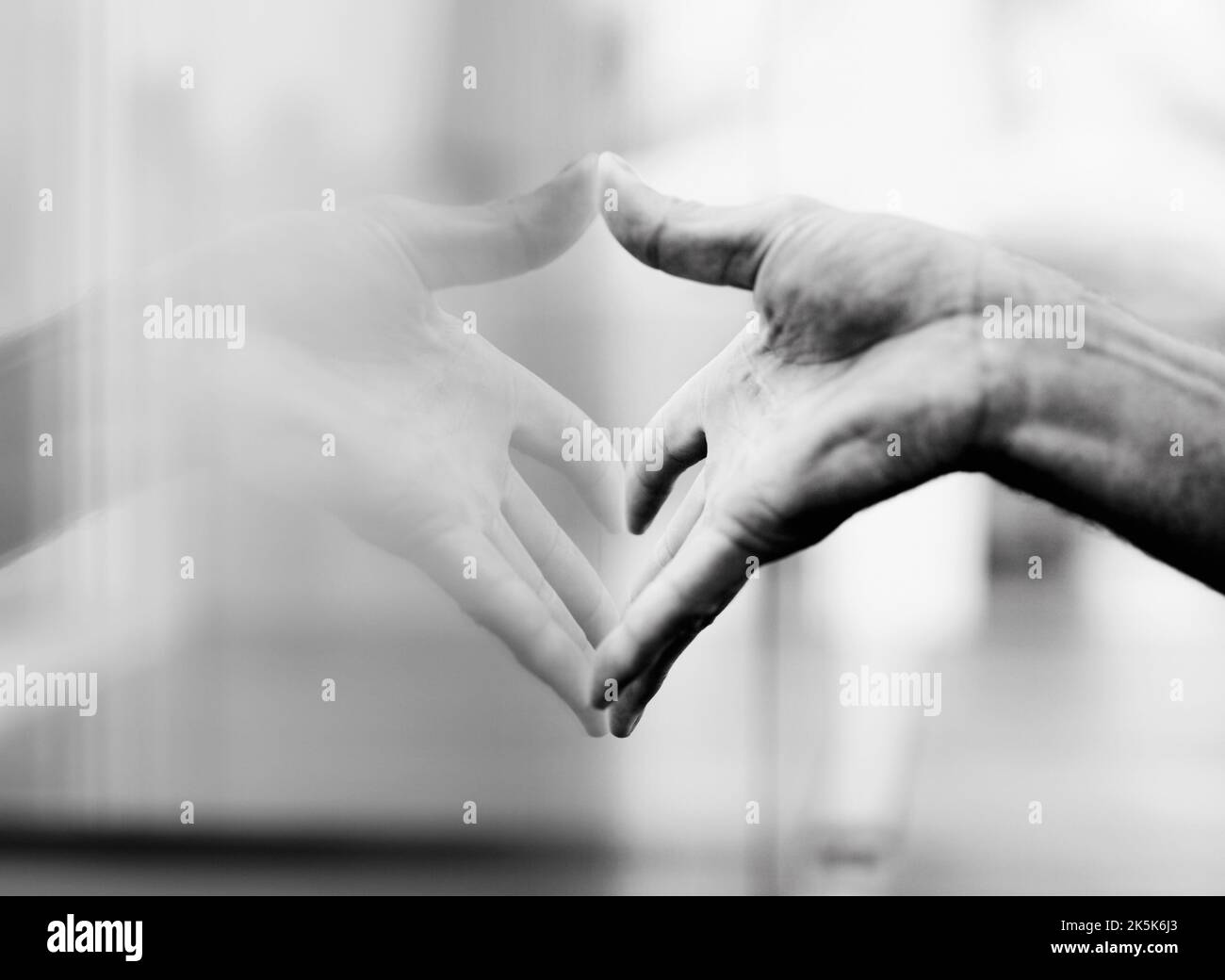 The reflective touch. A hand pressed against a window with itamp039s ...