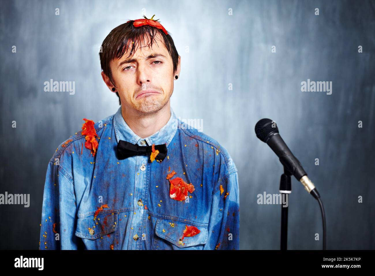 Bad jokes deserve rotten tomatoes. Portrait of an unsuccessful standup ...