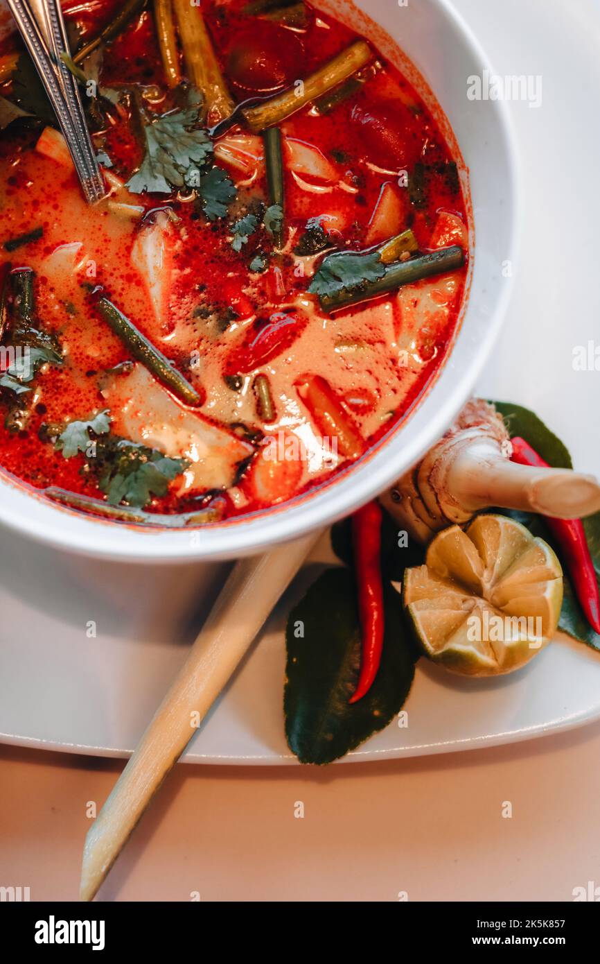 Tom Yum kung Spicy Thai soup with shrimp lime and red chilli. Vertical Stock Photo - Alamy