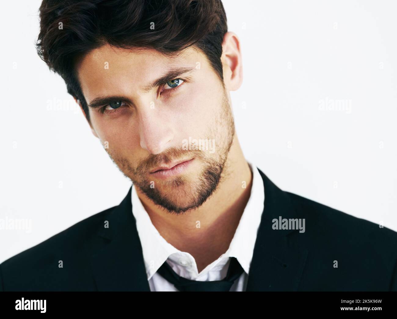 The look of a man who knows what he wants. Cropped portrait of a young ...