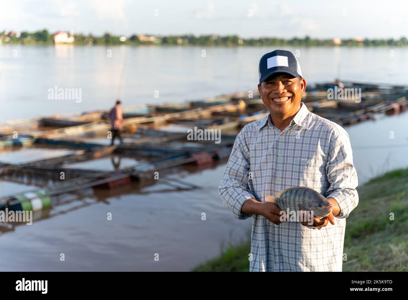Aquaculture farmers hold quality tilapia yields in hand, guaranteeing ...