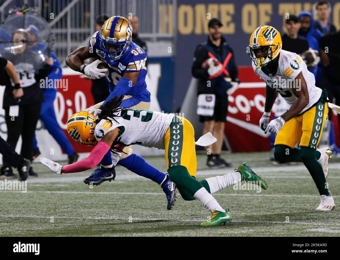 Winnipeg Blue Bombers' Rasheed Bailey (88) pushes Edmonton Elks ...
