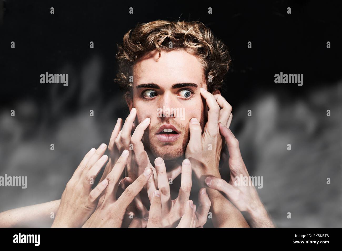 Having a paranoid hallucination. A mans head being grabbed by many ...