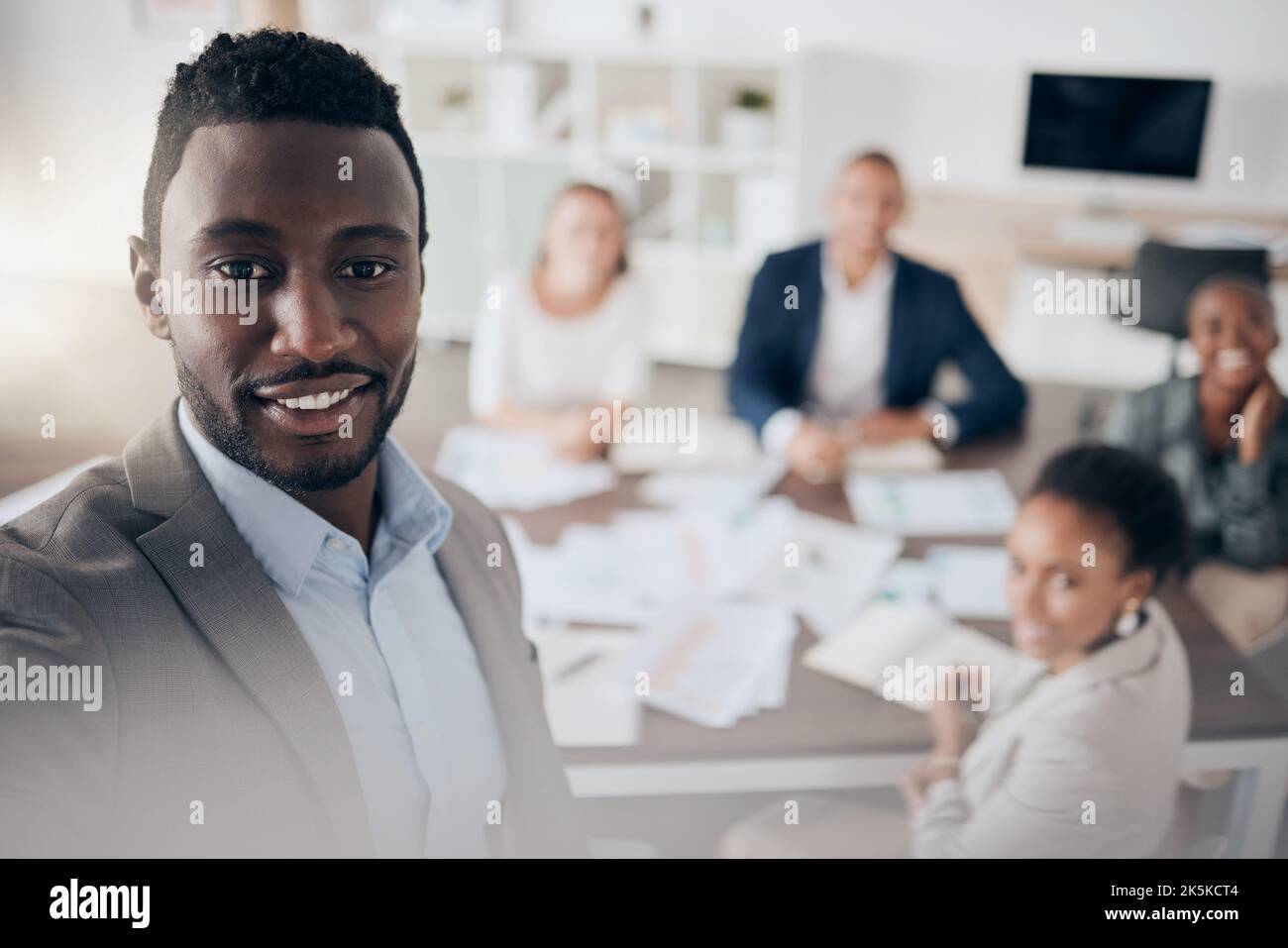 Presentation, black man and finance meeting with a group of business ...