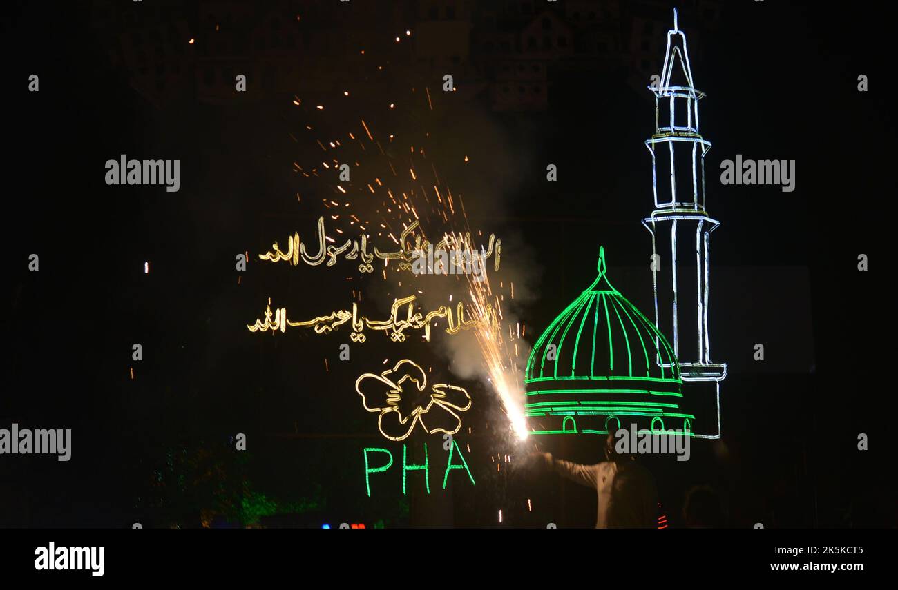 Lahore, Punjab, Pakistan. 8th Oct, 2022. Pakistani people light ...