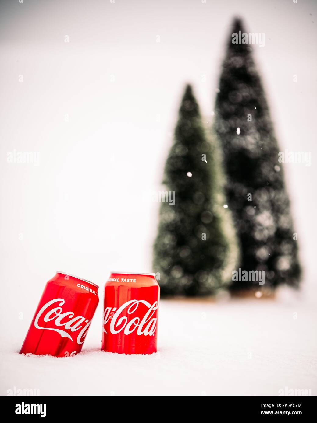 The Coca Cola cans with small Christmas trees in the background Stock ...