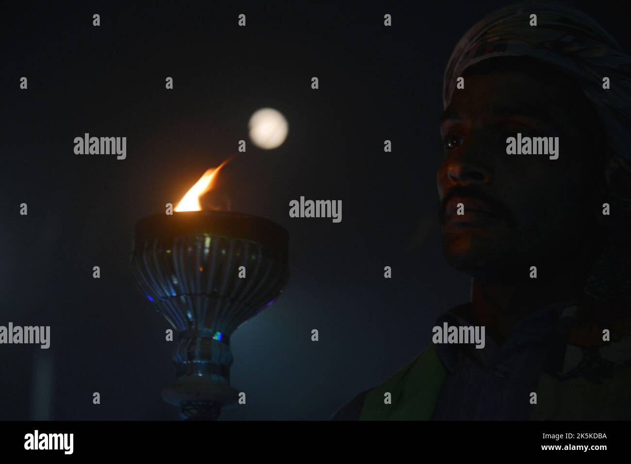 Lahore, Punjab, Pakistan. 8th Oct, 2022. Pakistani people light ...