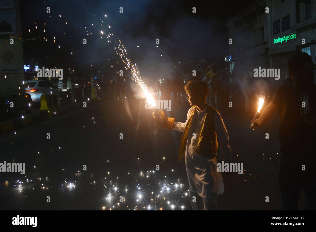 Lahore, Punjab, Pakistan. 8th Oct, 2022. Pakistani people light ...