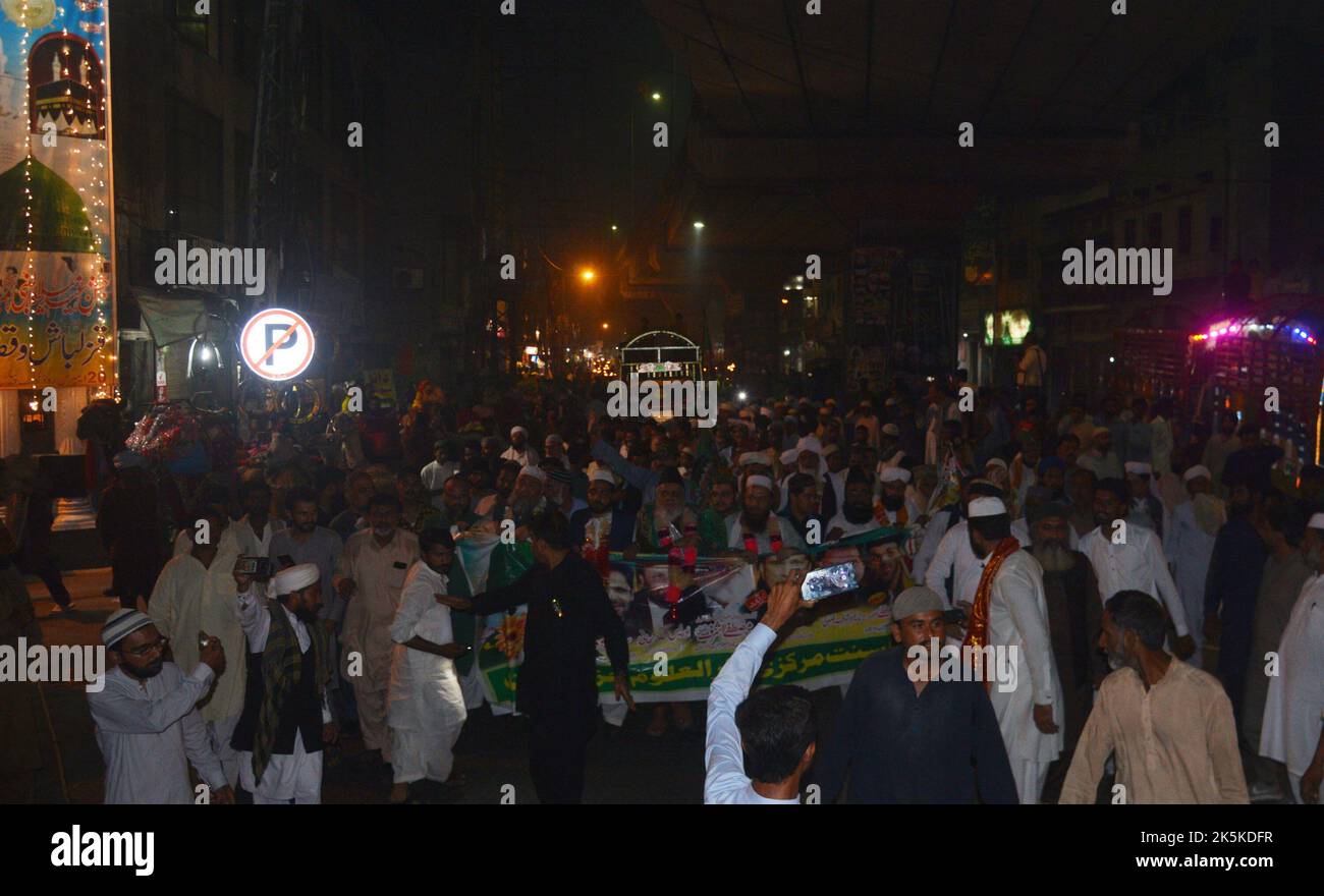 Lahore, Punjab, Pakistan. 8th Oct, 2022. Pakistani people light ...