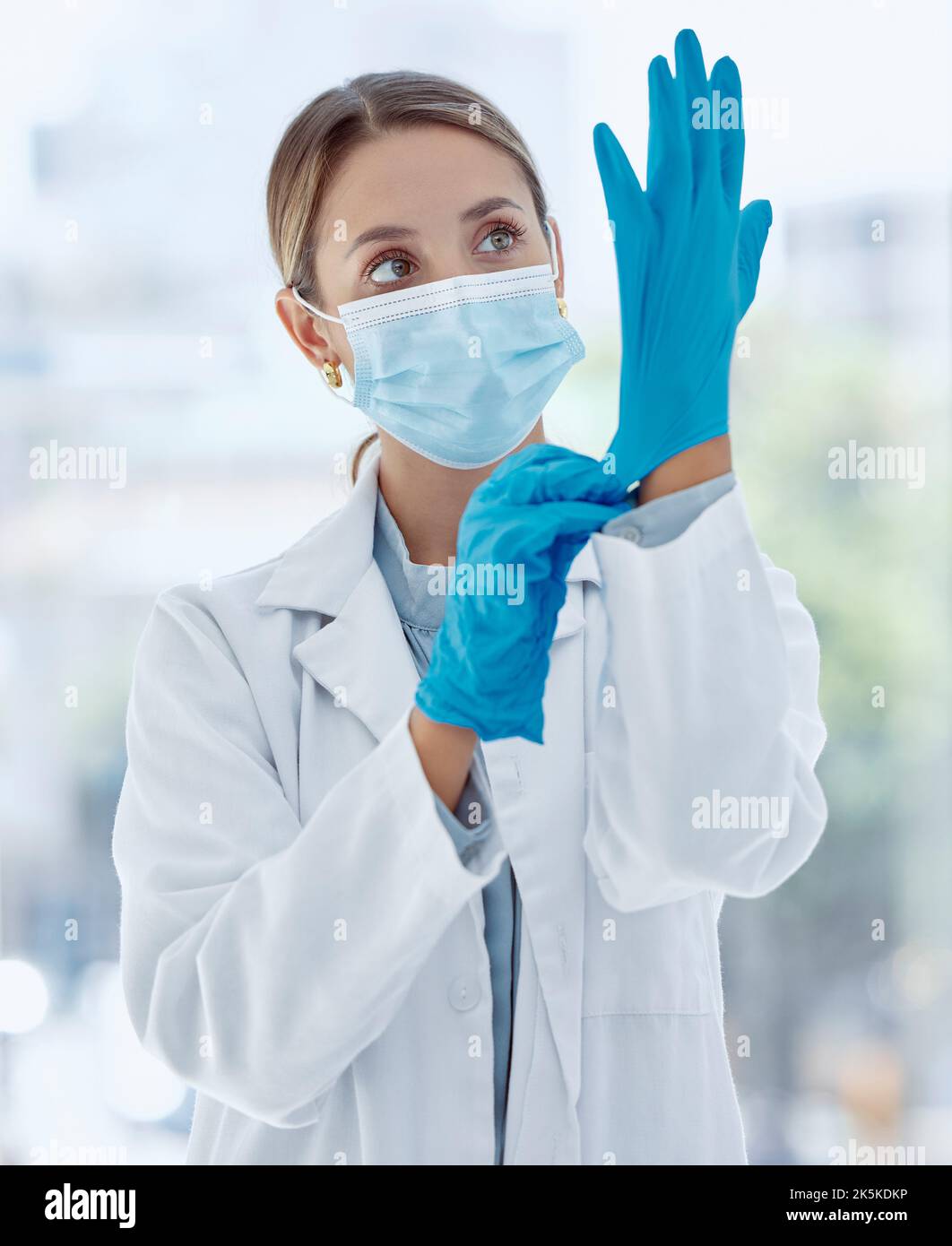Doctor mask, covid gloves and woman ready for operation, surgery or ...