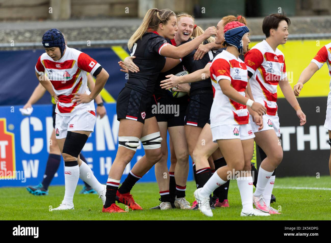 Canada's Paige Farries celebrates scoring the opening try for Canada ...