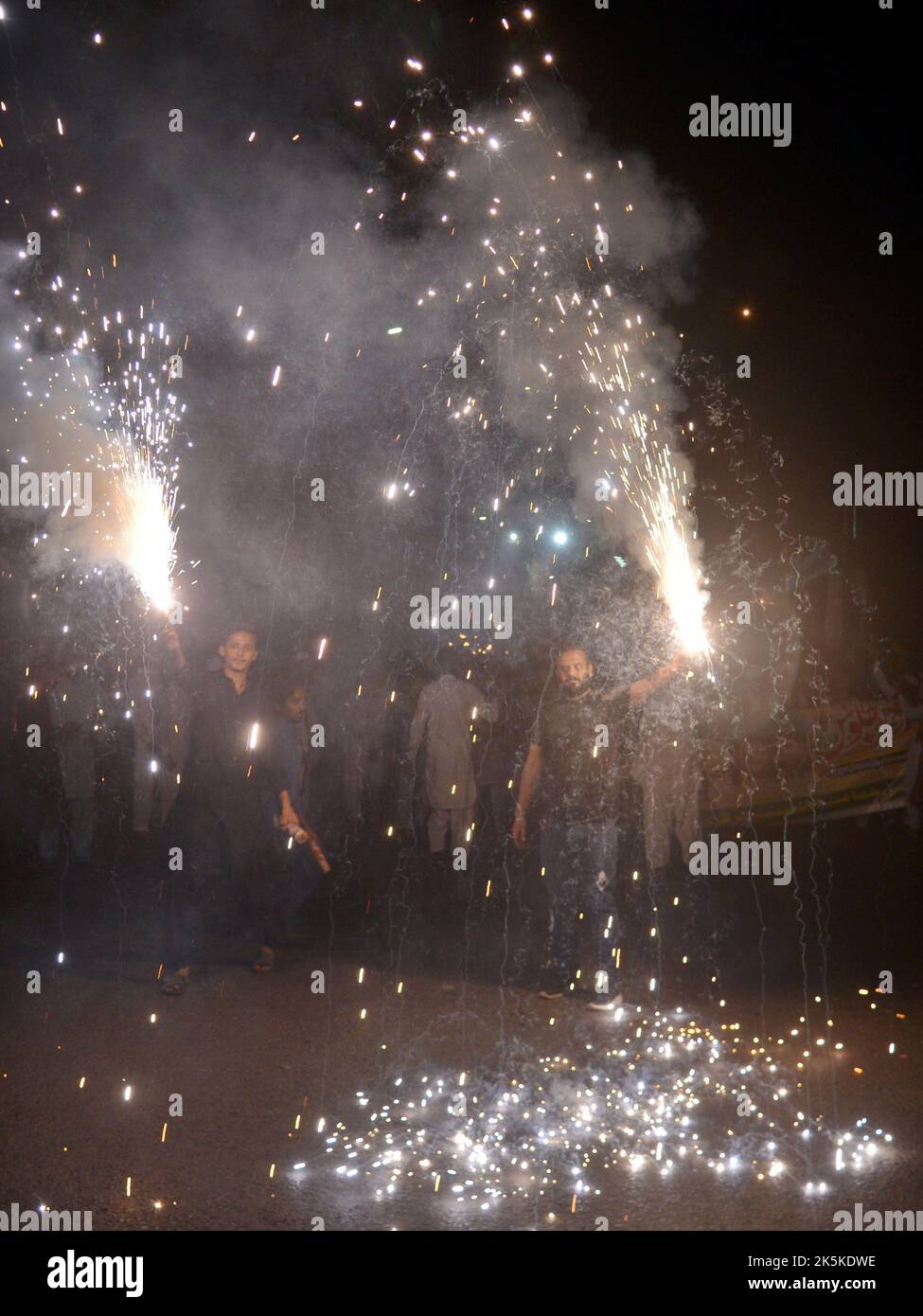 Lahore, Punjab, Pakistan. 8th Oct, 2022. Pakistani people light ...