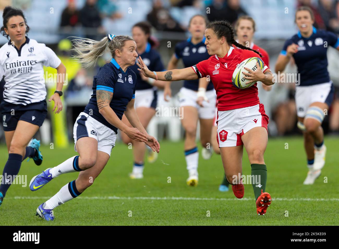 Wales Ffion Lewis holds off Scotland's Chloe Rollie during the Women's ...