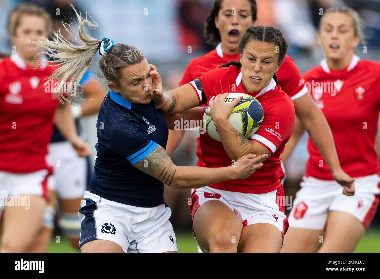 Wales Ffion Lewis holds off Scotland's Chloe Rollie during the Women's ...
