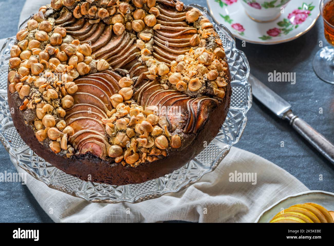 Moist chocolate, pear and golden hazelnut torte Stock Photo - Alamy