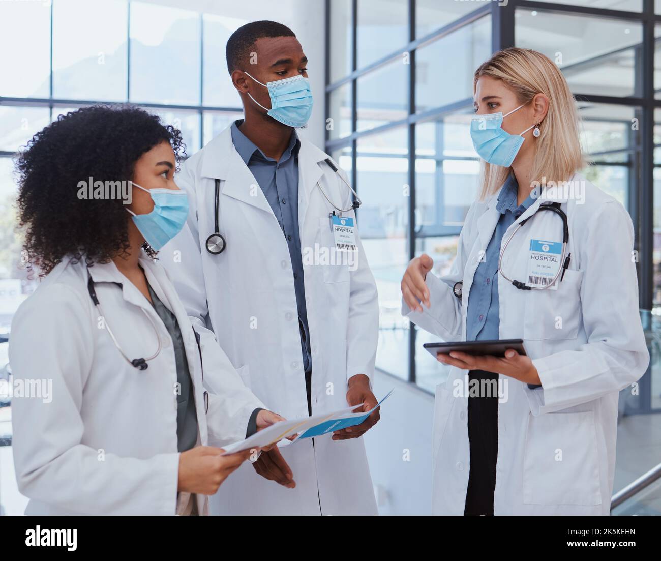 Covid, doctor and team communication with mask talk about medicine or ...