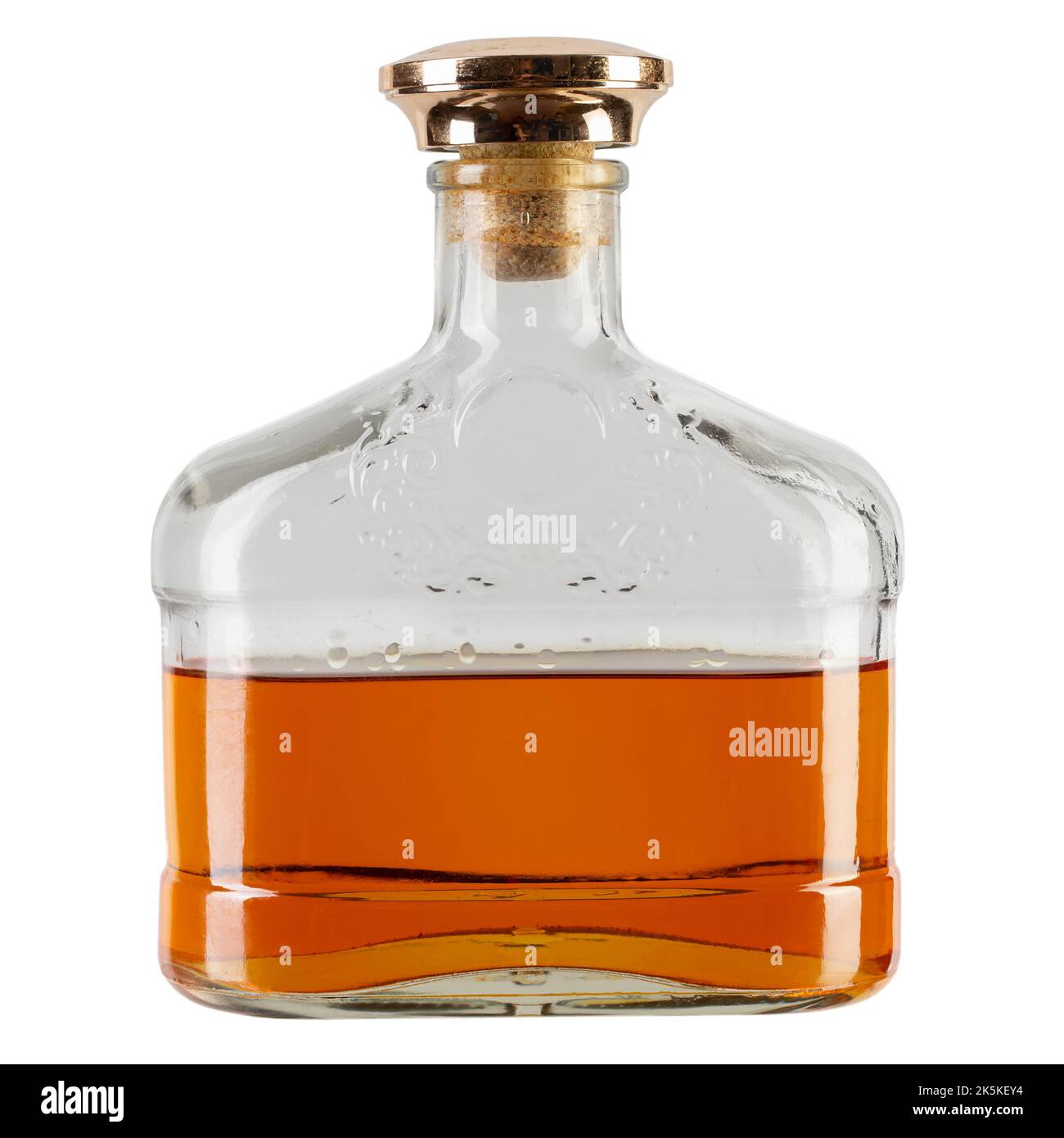 Half Bottle Of Strong Alcohol Whiskey Or Cognac Isolated On White Background File Contains