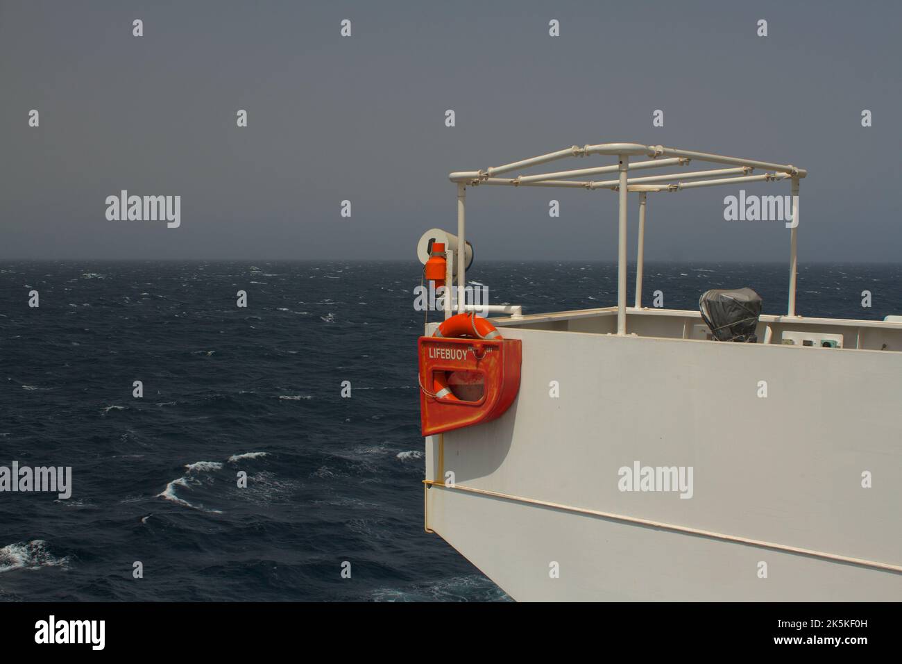 View of the bridge wings and look post on board a ship at sea in the ...