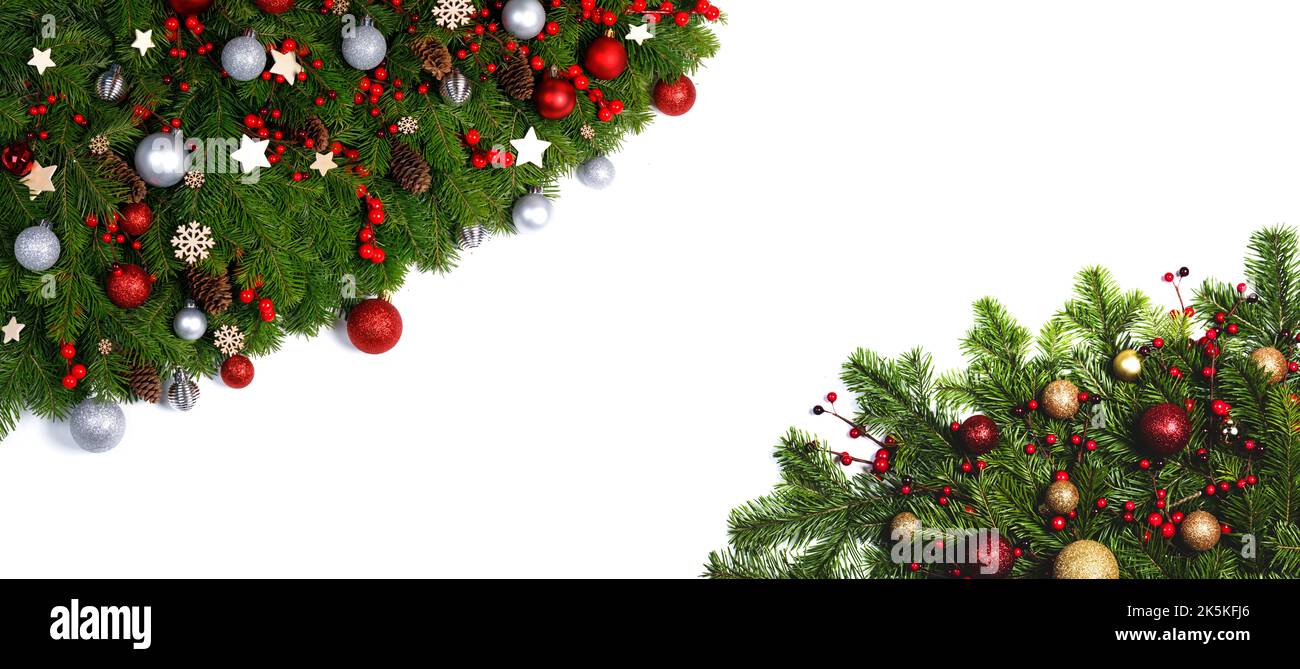 Christmas tree branches with red baubles, golden stars, pine cones ...