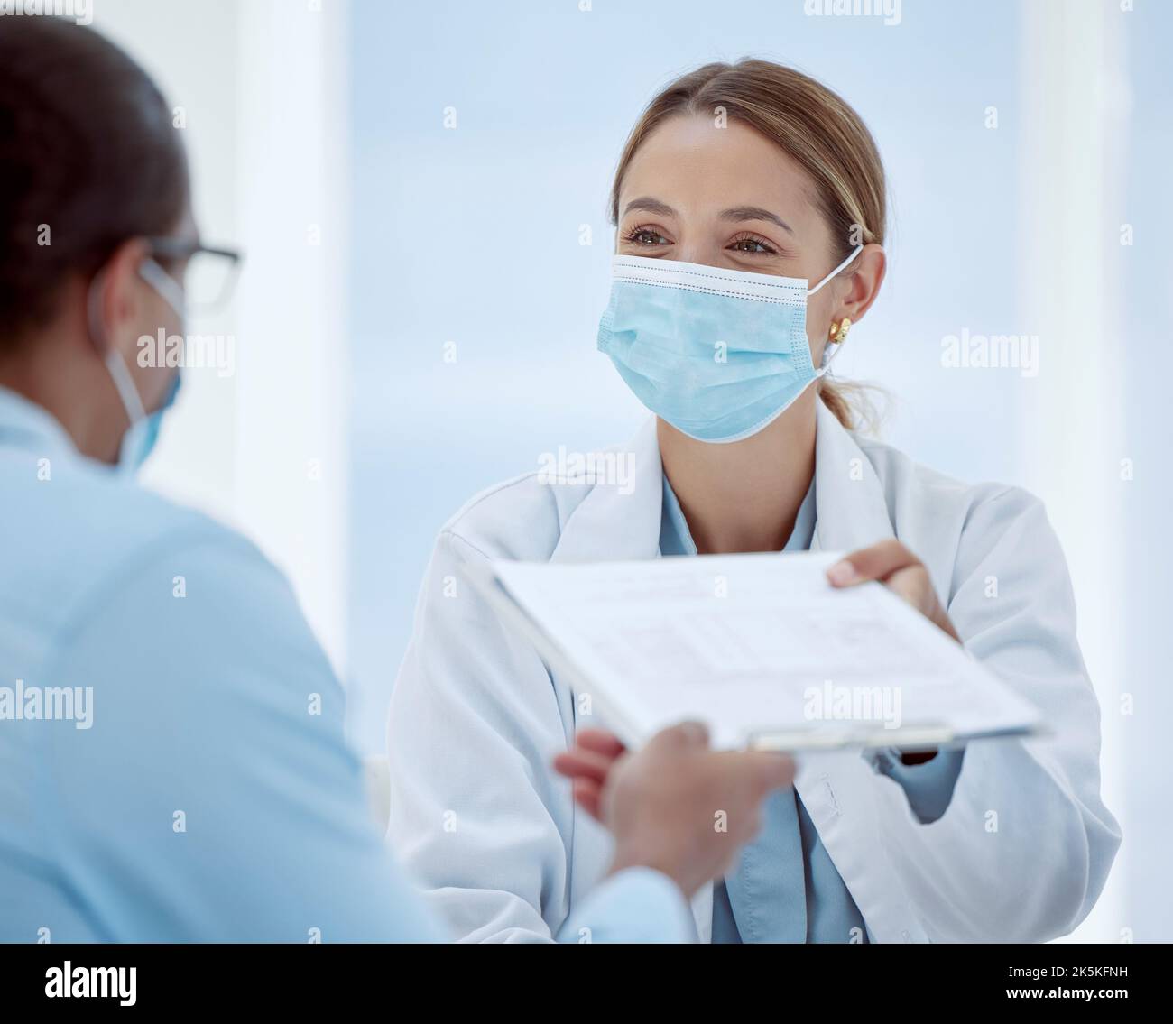 Doctor, woman and covid patient form for health consultation advice and ...