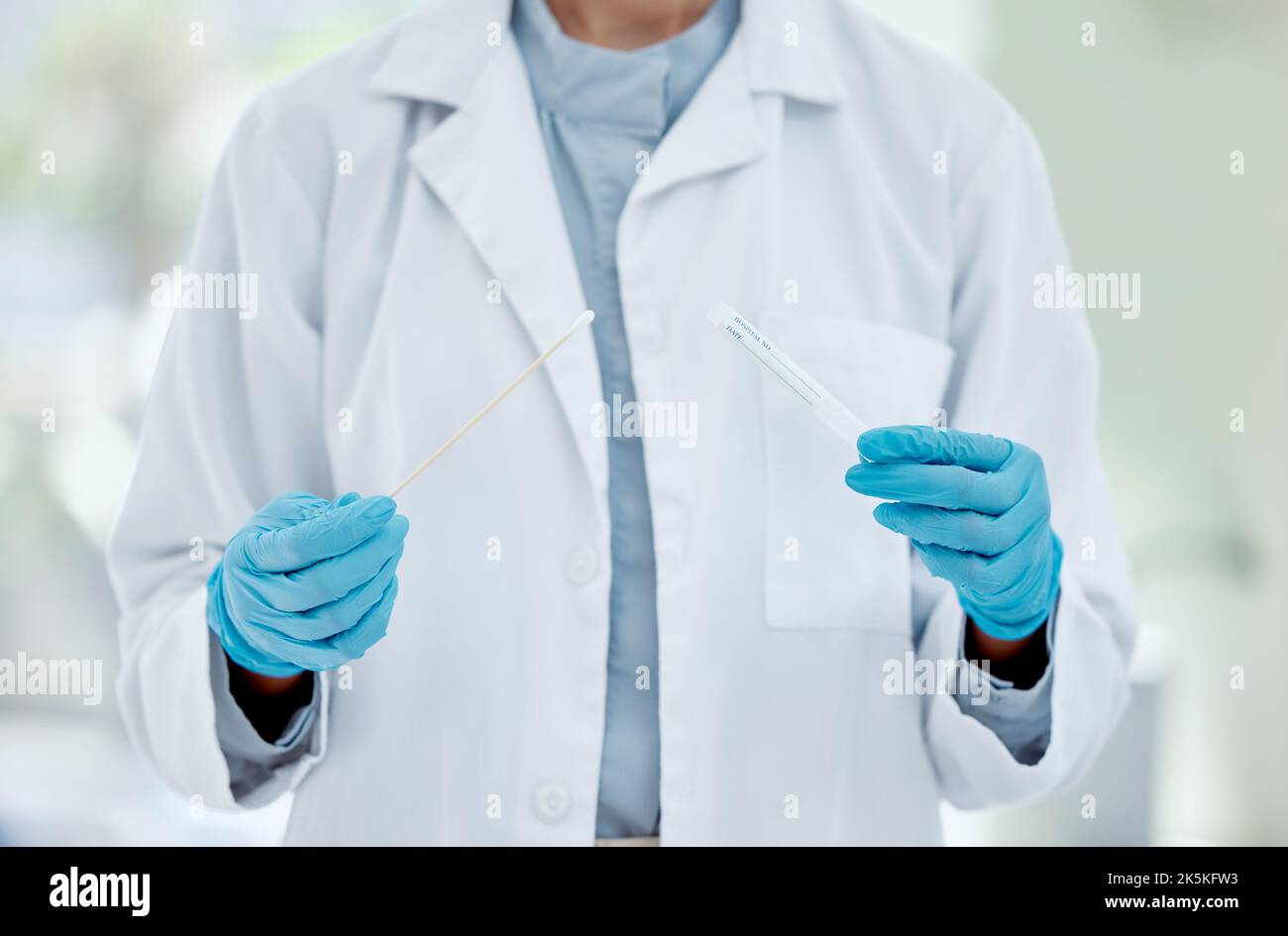 Healthcare, hand and doctor with covid test in a hospital, hands ...