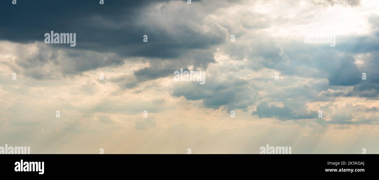 Dramatic Sky Background with sunny beams. Panoramic view of Stormy ...