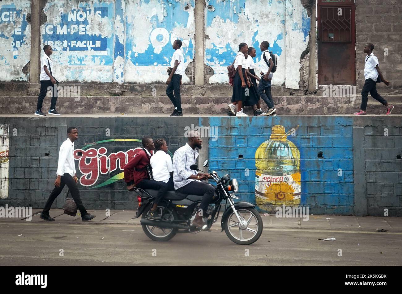 Daily life along the streets in the city centre of Kinshasa in the ...